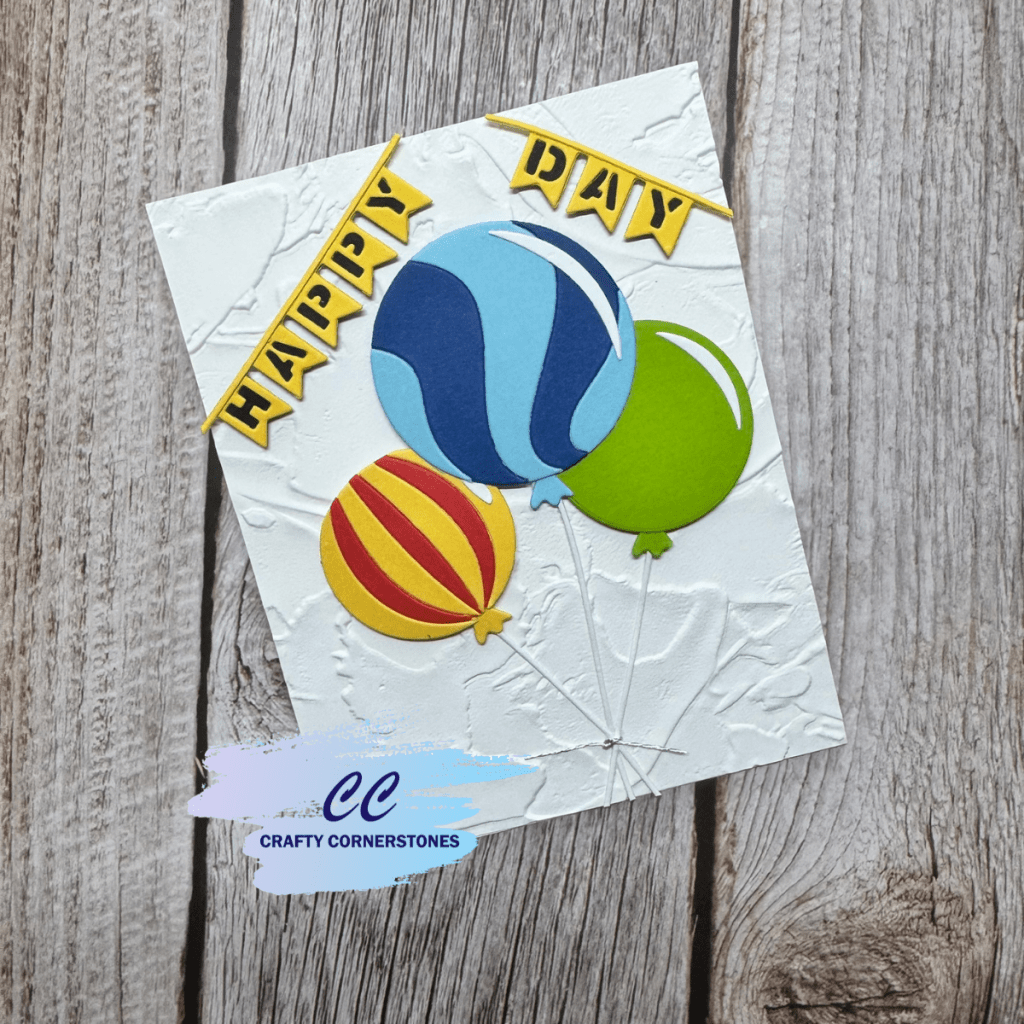 Day 8 Spellbinders Advent – Happy Day Banner Card – Crafty Cornerstones
